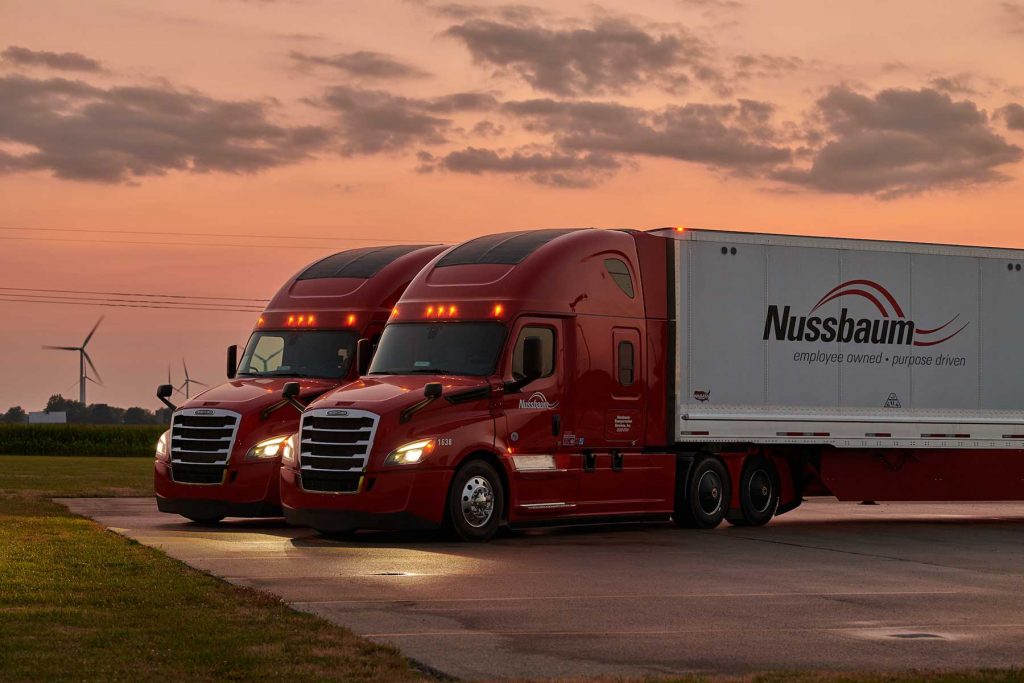 TrucksDusk_large | Nussbaum Transportation